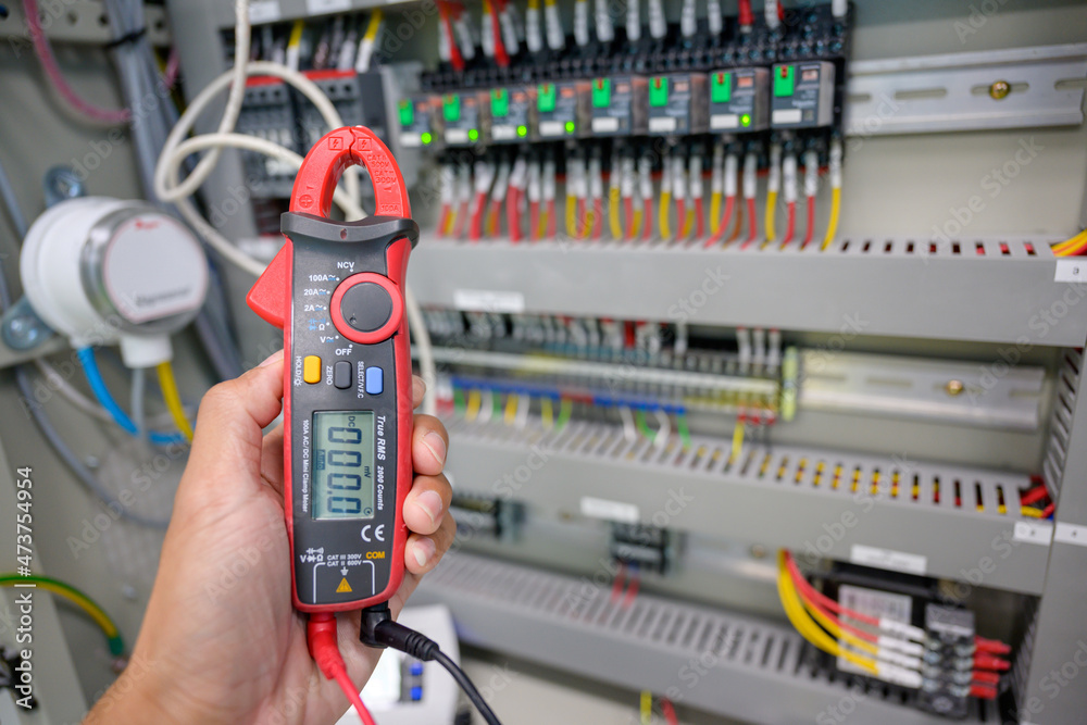 Electrical measurements with a multimeter tester industrial electricity ...