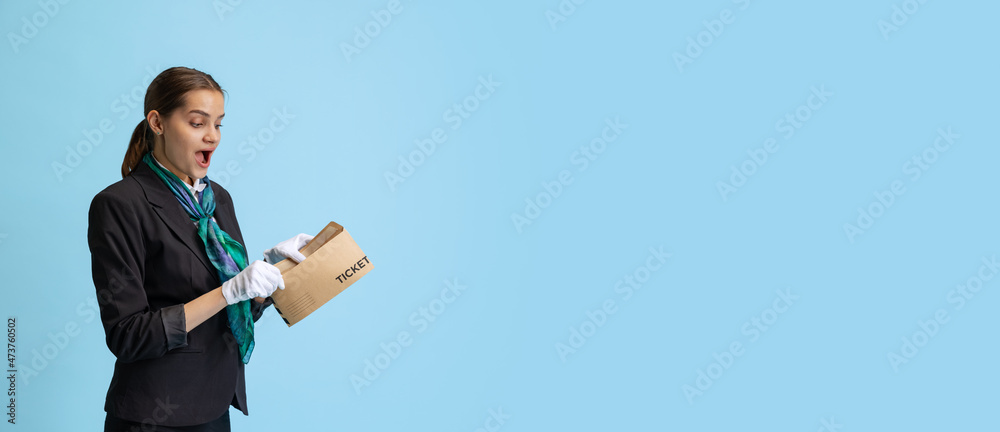 Flyer with beautiful young smiling girl, flight attendant in black ...