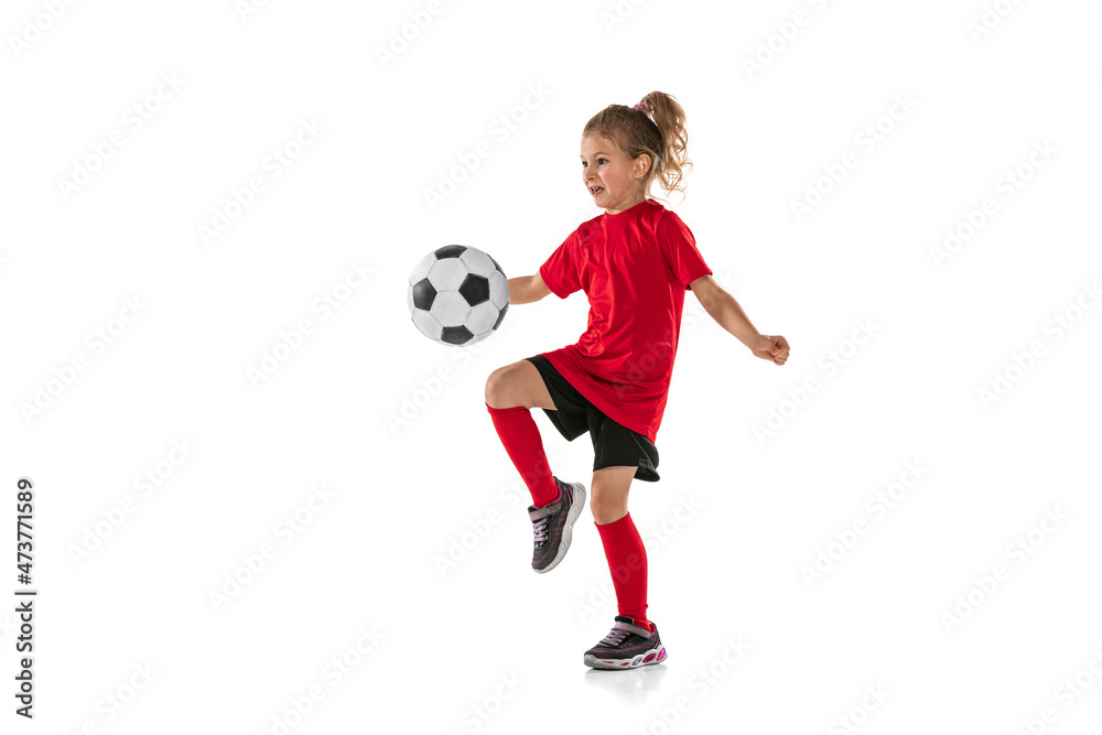 Full-length portrait of girl, child, football player in red uniform ...