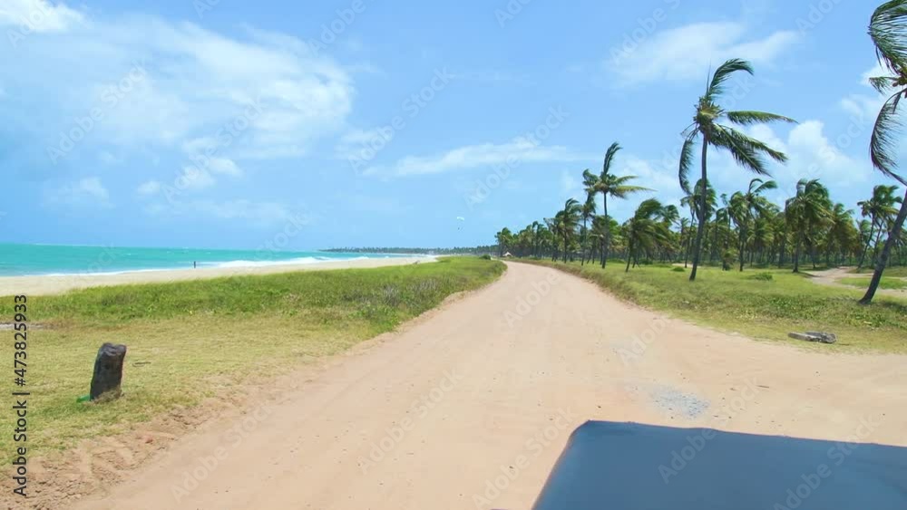 Buggy ride at Maracaipe beach, way to the Coconut Trees route. Tourist ...