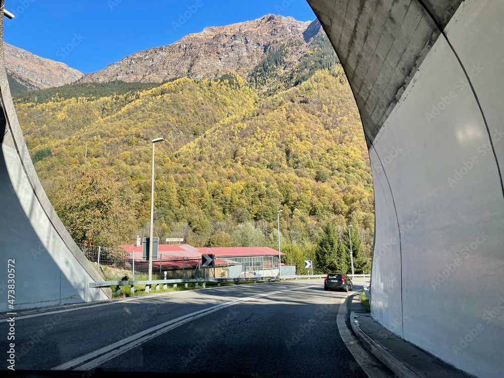Exit of highway tunnel with view of Swiss mountains. Stock Photo ...