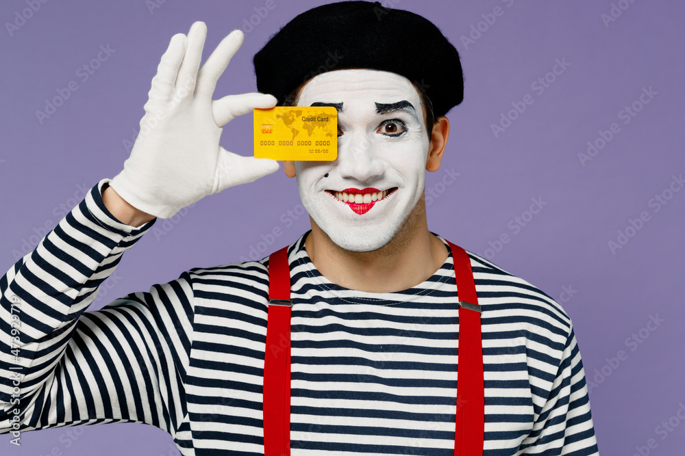 Charismatic happy fun young mime man with white face mask wears striped ...