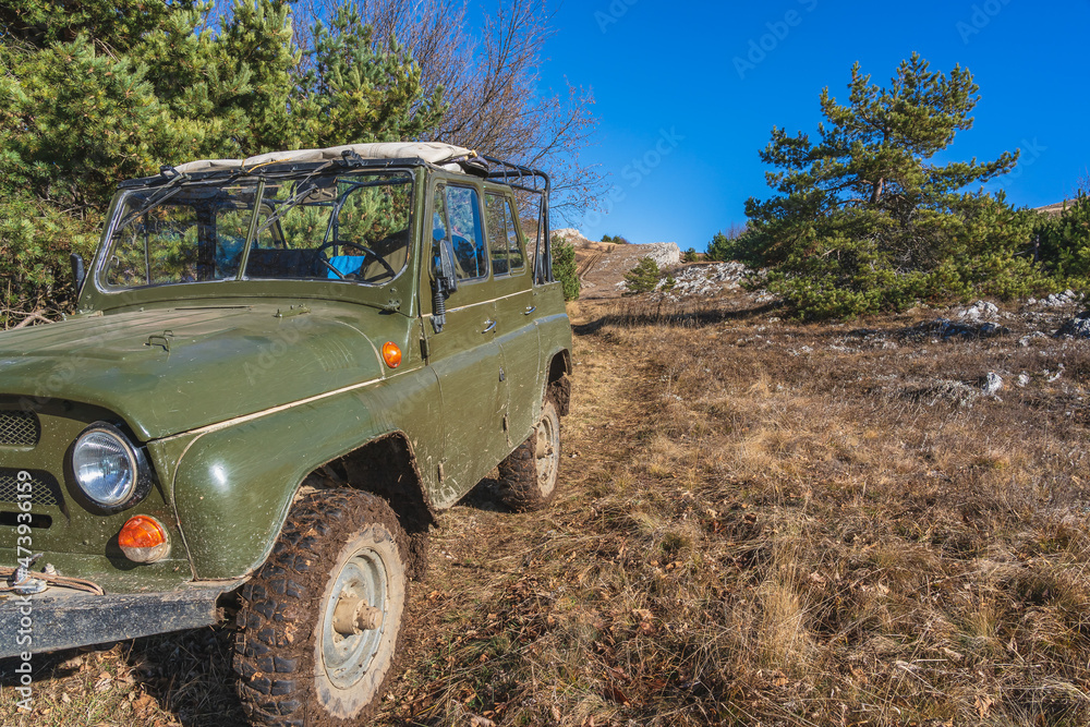 An old decommissioned Soviet military vehicle UAZ 469 as a tourist SUV ...