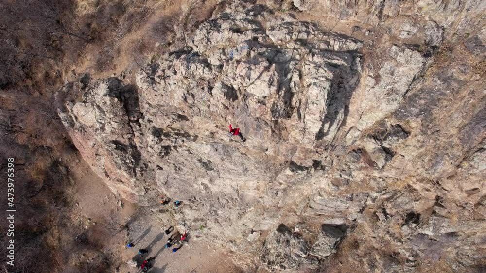 Rock climbing training on a steep slope in the mountains. The view from ...