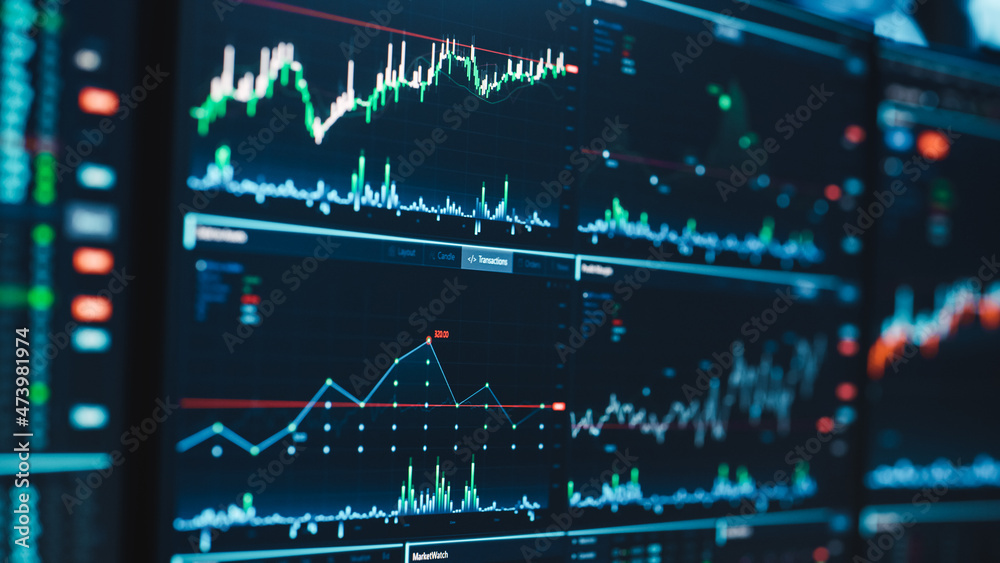 Close Up Footage of a Computer Monitor Screen with Real-Time Stocks ...