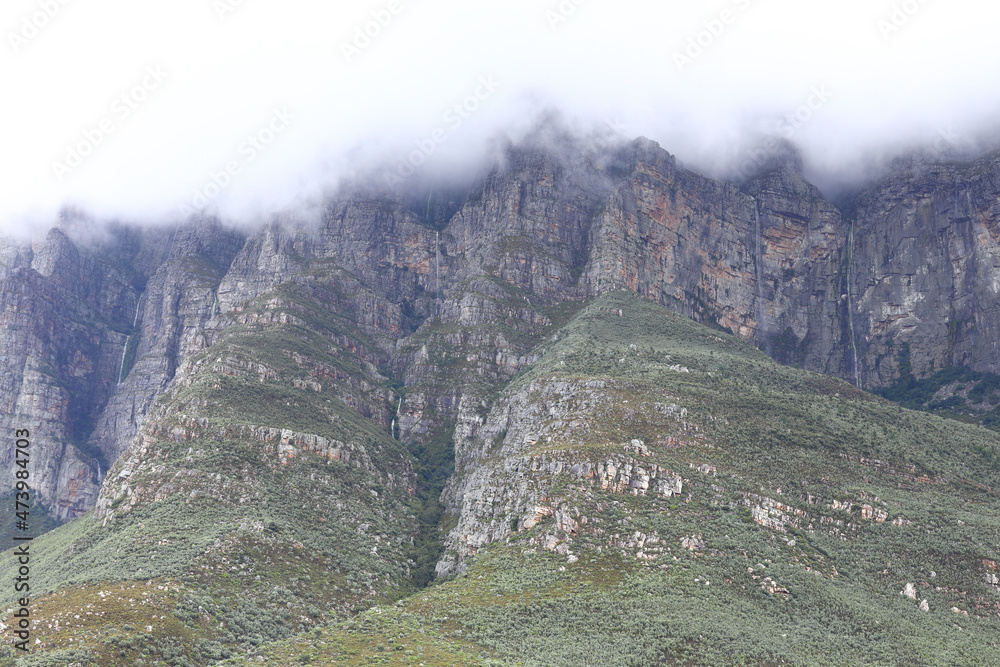 Waterfalls streaming down the majestic du Toitskloof mountains with ...