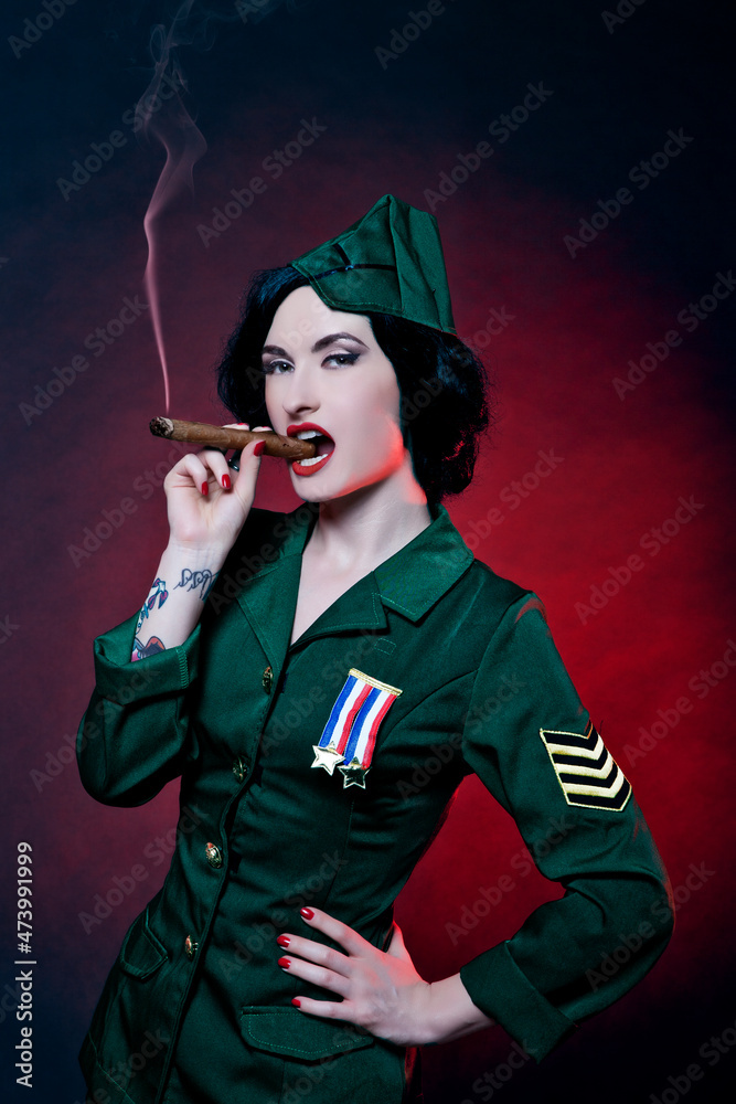 Portrait of a Pinup Burlesque Diva performing in military dress ...