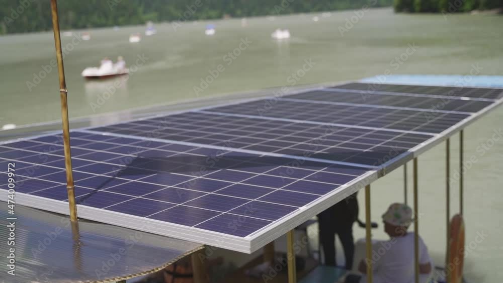 The boat is solar powered. The boat's electric motor runs on solar ...