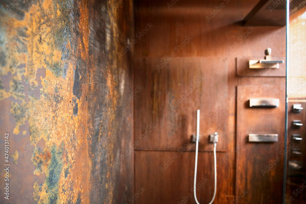 Bathroom with corten steel wall cladding Stock Photo | Adobe Stock