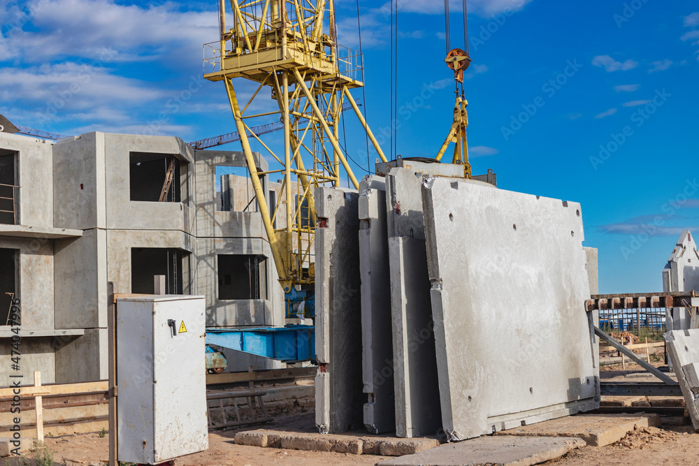 Many precast concrete wall panels are stocking in the storage area ...