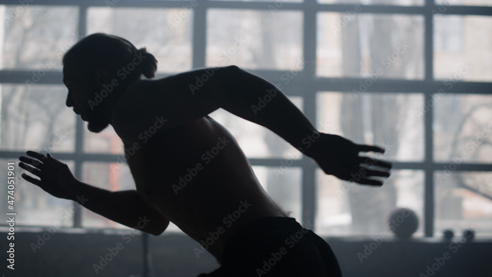 Active man running in sport gym. Shirtless male jogger doing cardio ...