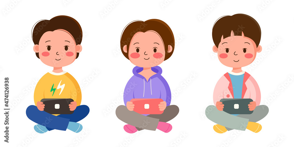 Cute children playing in a portable handheld console while sitting on ...