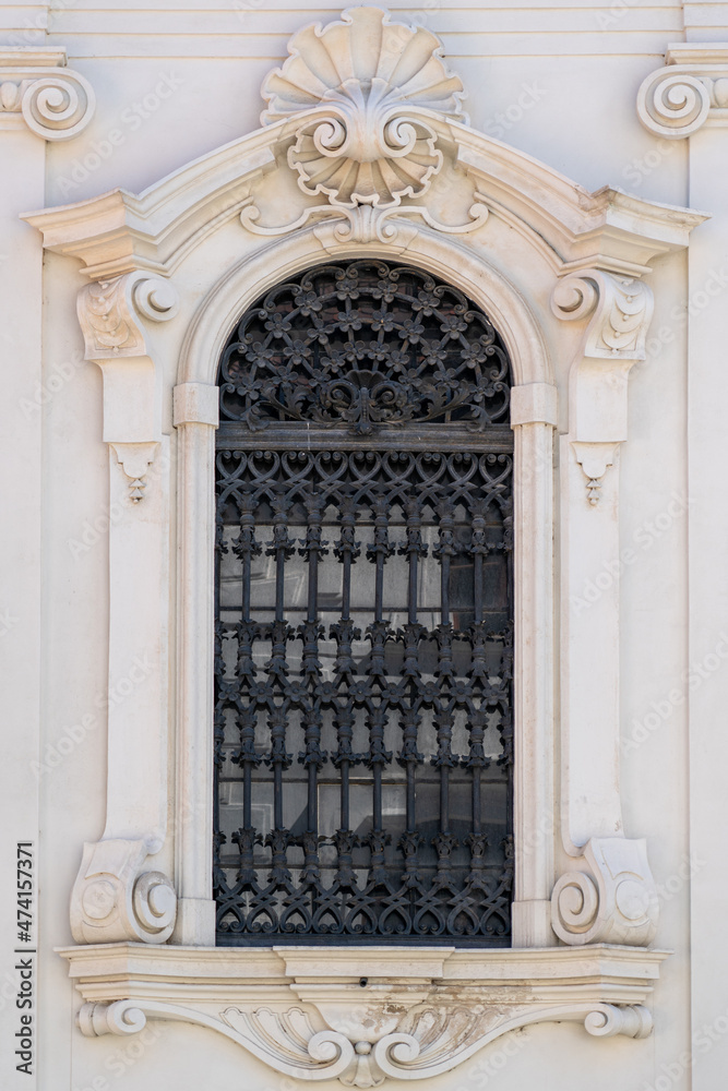 Baroque window with ornate borders and iron grill - Bratislava ...