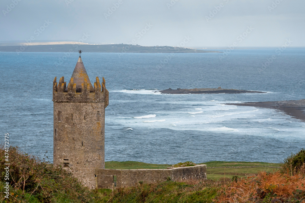Stone tower and walls of Doonagore Castle, county Clare, Ireland ...