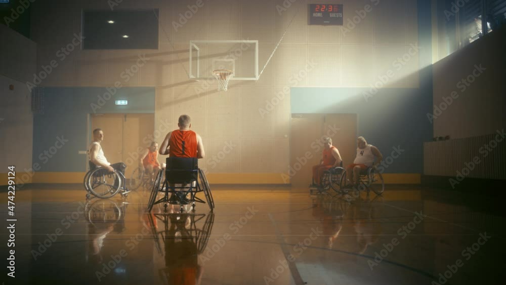 Wheelchair Basketball Game: Professional Players Competing, Dribbling ...