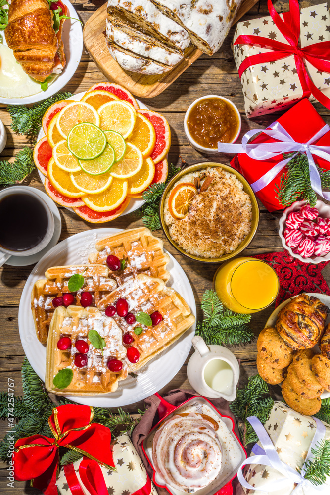 Festive Christmas morning breakfast or brunch table, with traditional ...