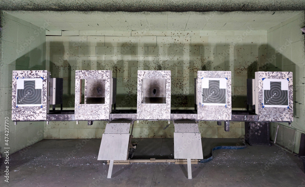 New modern shooting gallery. Indoor shooting range with targets Stock ...