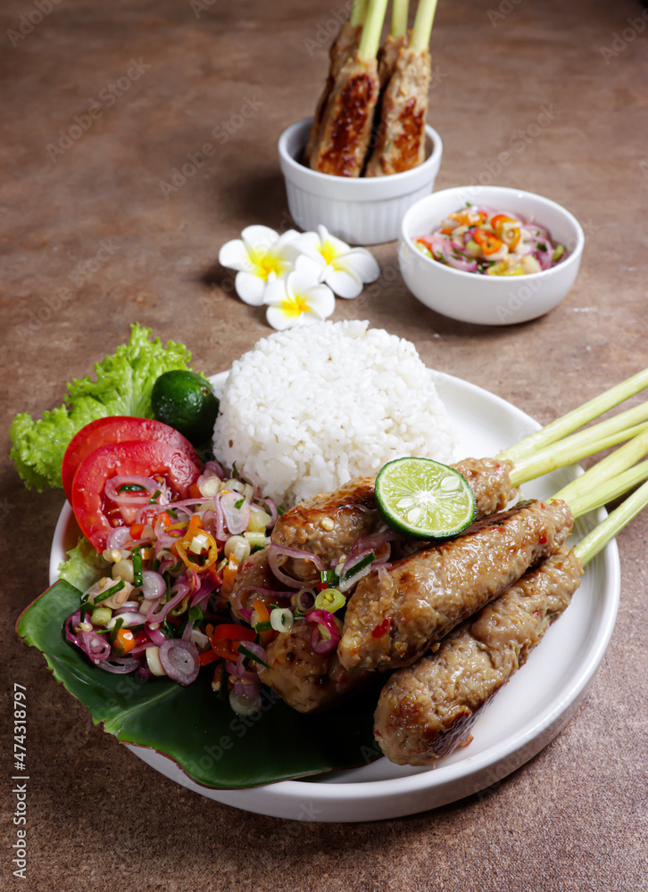 Sate Lilit, traditional Balinese minced seafood or chicken satay with ...