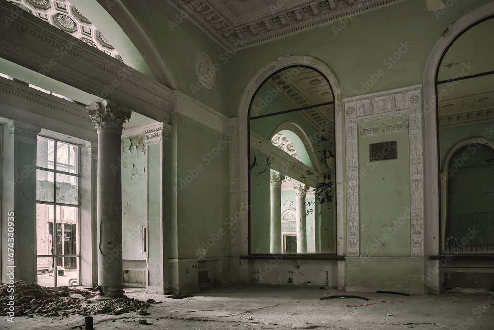 Beautiful interior of an old abandoned palace. Hall with high ceilings ...
