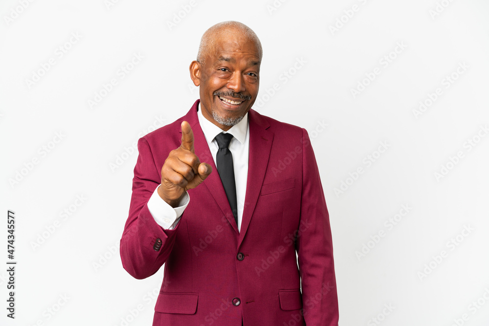 Cuban senior isolated on white background surprised and pointing front ...