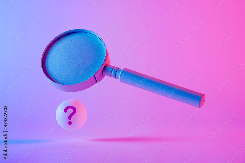 Magnifying glass floating above a sphere with question mark Stock ...