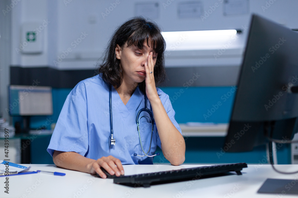 Medical assistant falling asleep while using computer and keyboard for ...
