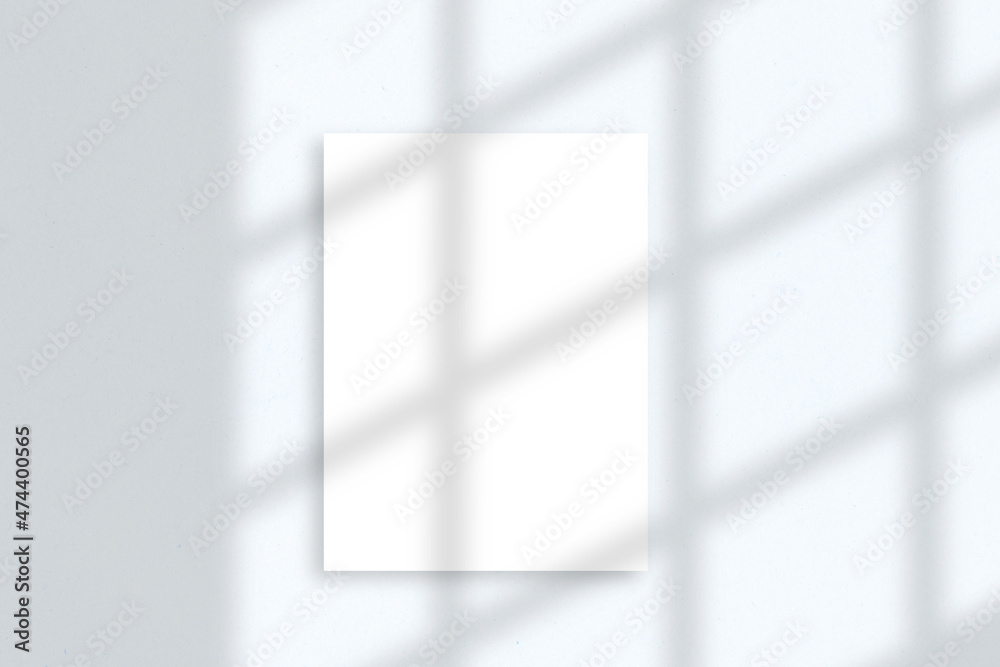 Interior wall with blank photo or poster with window shadow. 스톡 사진 ...