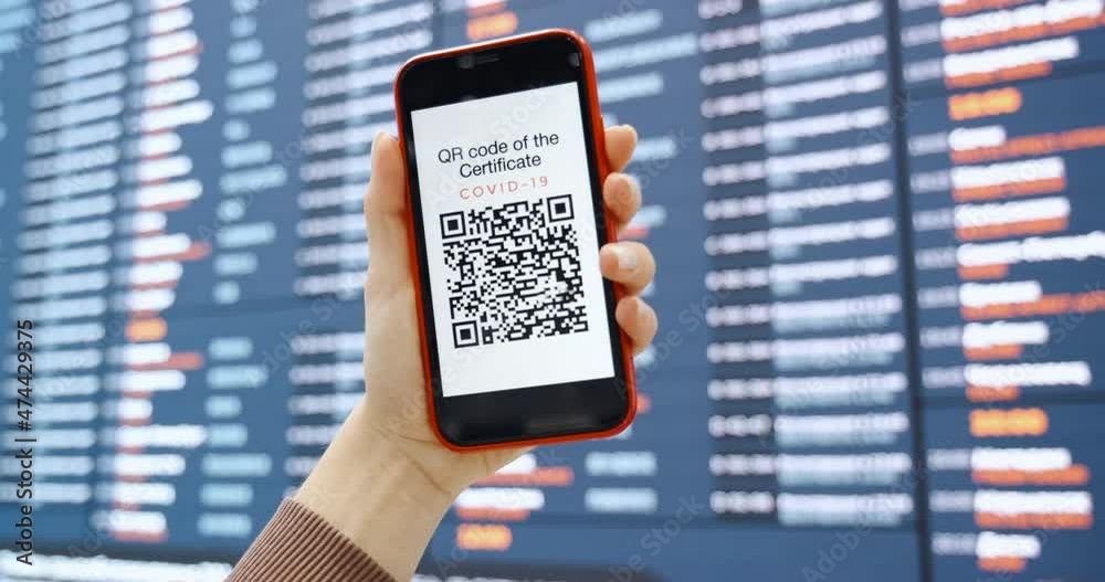 Passenger shows fake and non-active QR code in airport on screen of ...