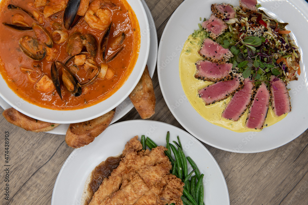 Buffet table of plenty of choices of food dishes to eat, hot off the ...