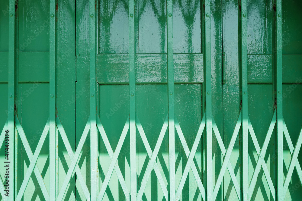 Horizontal traditional retro Hong Kong style green shop front building ...