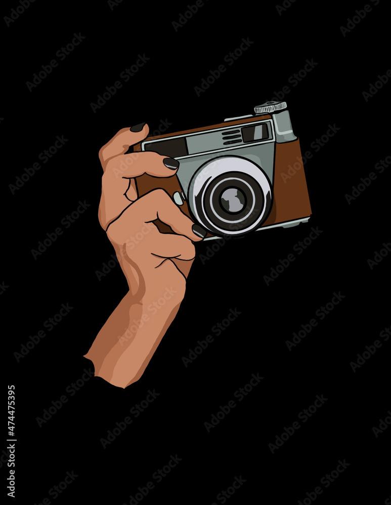 Human hand holding vintage camera and taking image - black background ...