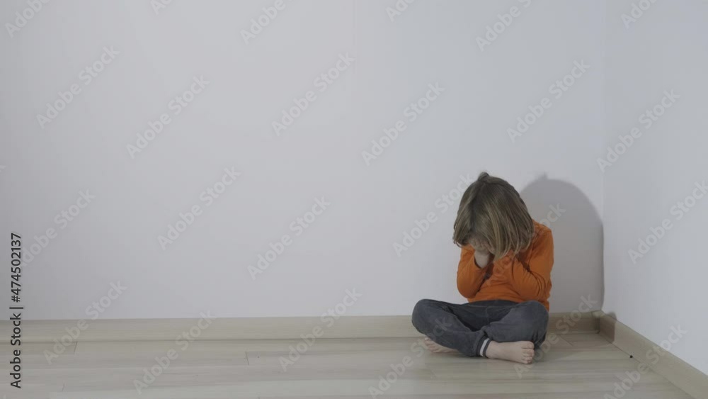 Hand shadow pointing with finger reflected on wall threatening scared ...