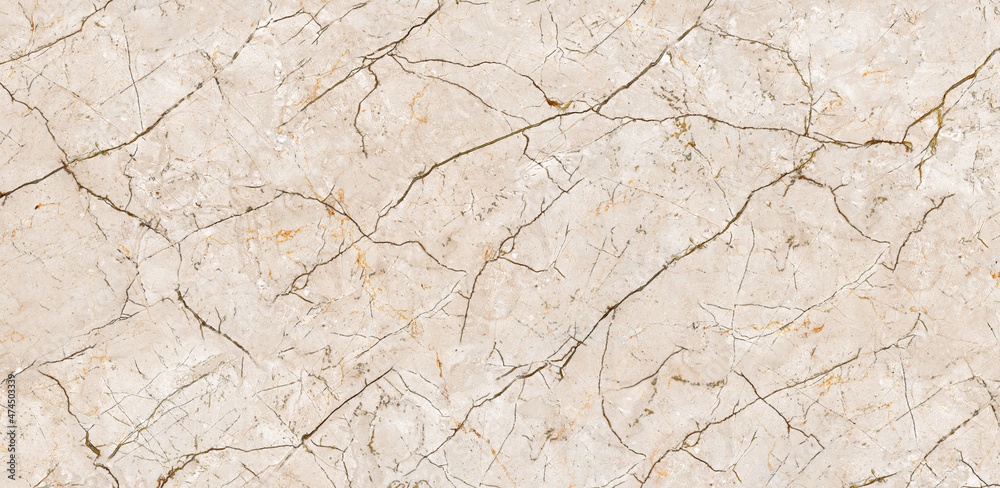 Spider beige marble stone having a grey backdrop with thin golden veins ...