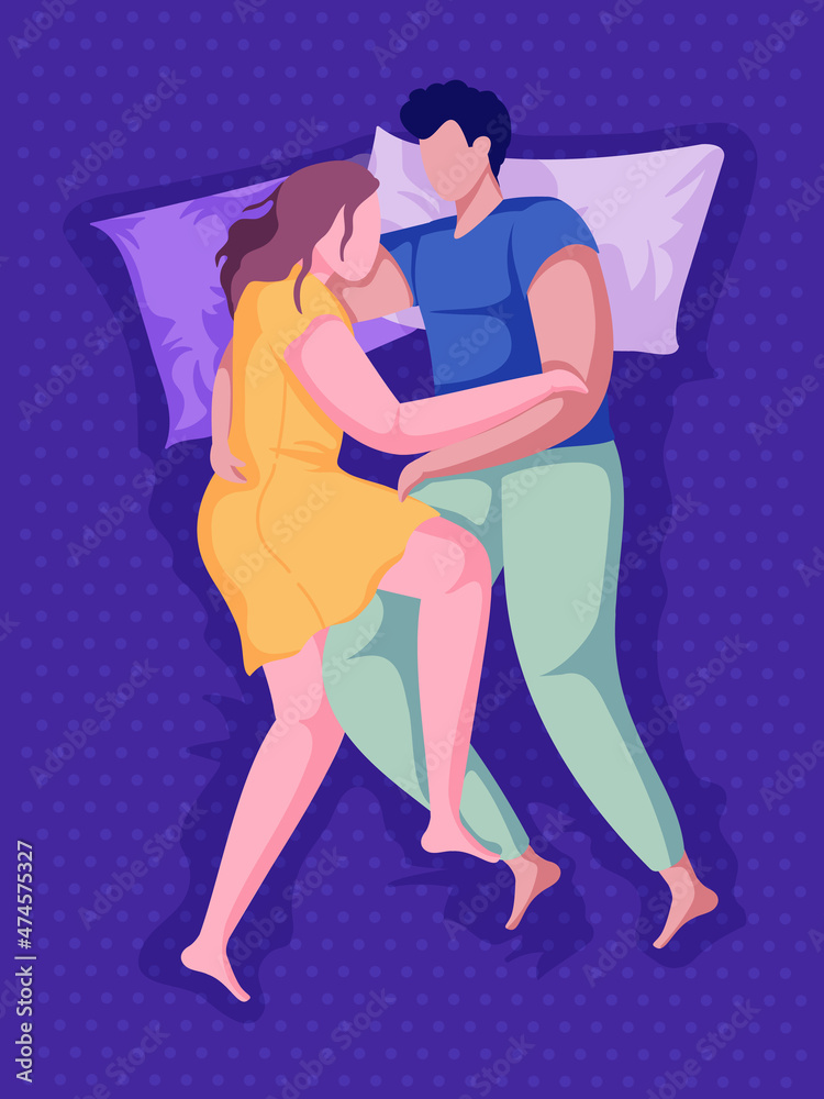 Happy couple lying in a soft bed at night. Lovers share intimacy ...