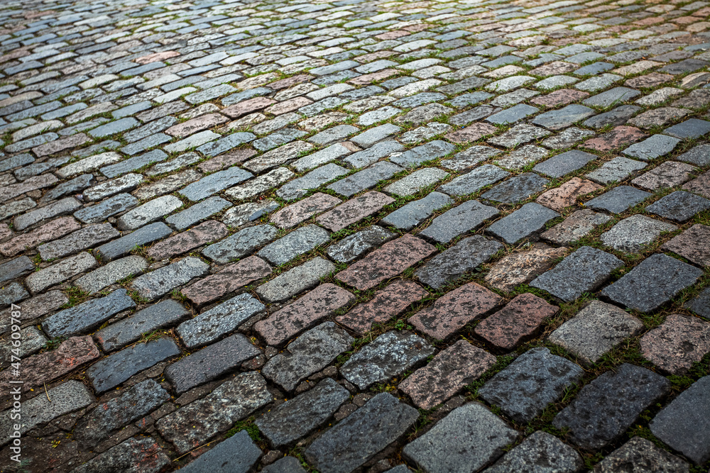 Cobblestone street texture. Regular shapes of cobblestone road ...