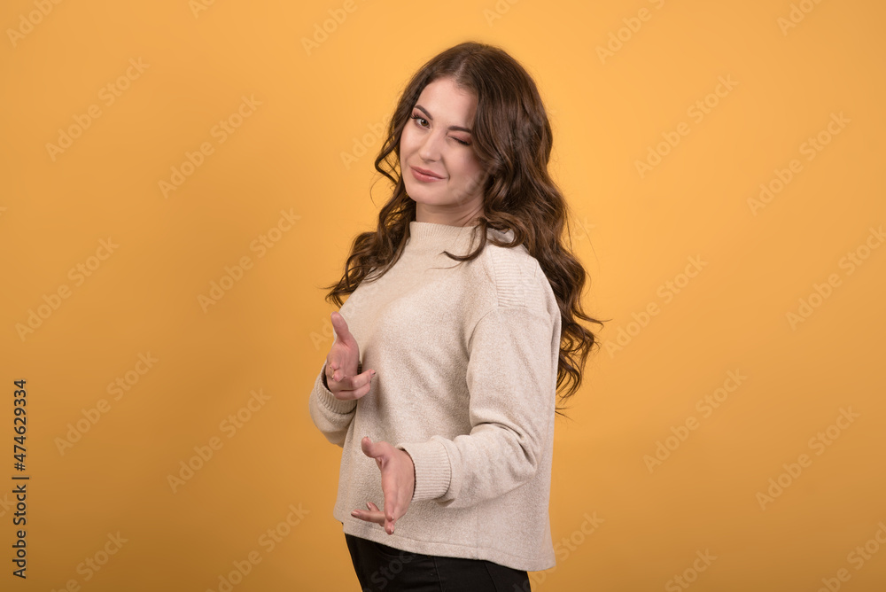 Hey you, bang. Charismatic Caucasian brunette girl with wavy hair in a ...