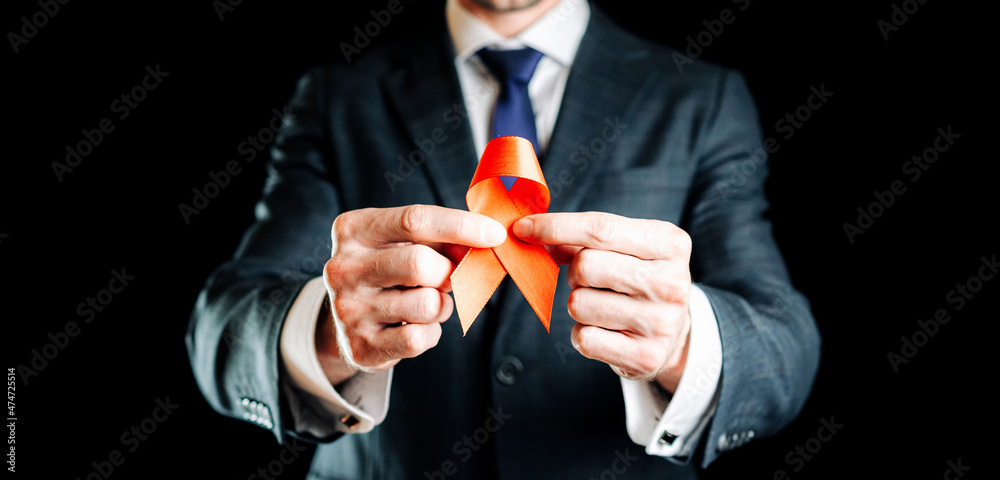 Aid ribbon silk. Red ribbon in hiv world day in man hand. Awareness ...
