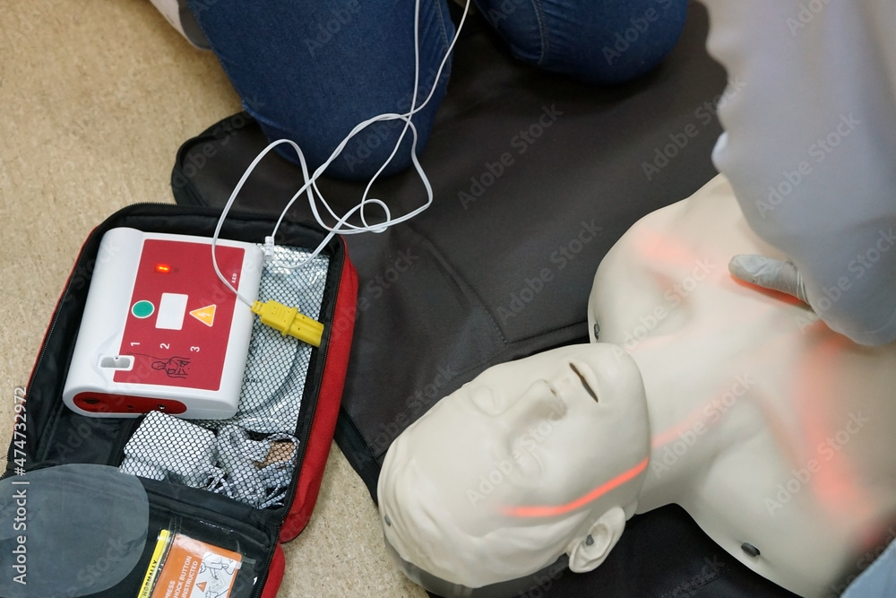 Chest compressions by a student on a simulation dummy during basic life ...