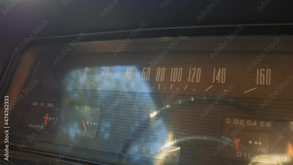 The dashboard in a retro car. Dial and arrow of the speedometer ...