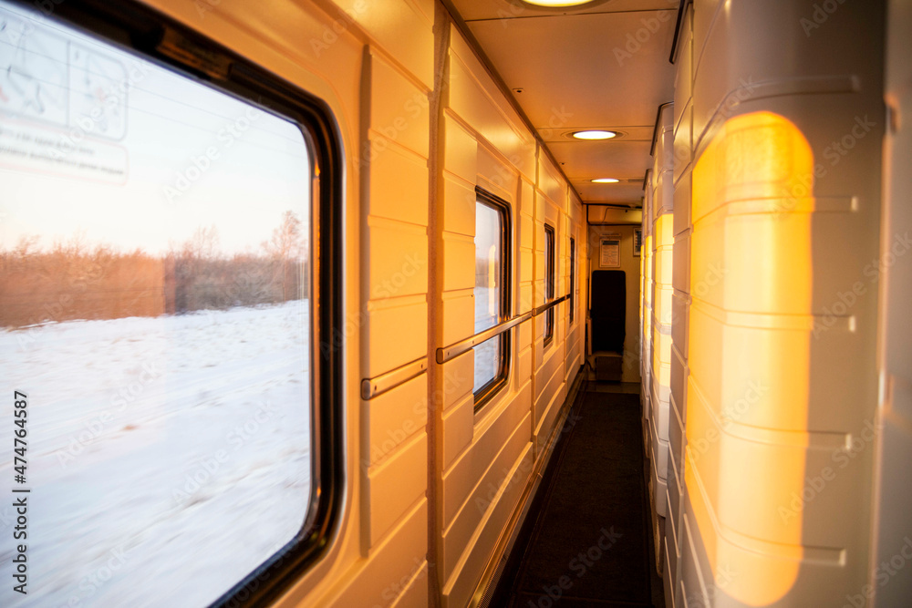 view from the window of a high-speed train in the aisle of a ...