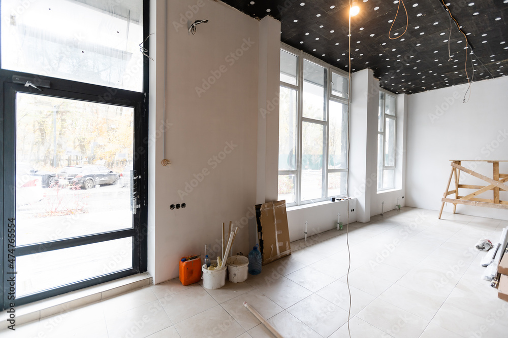 renovated room with shopping window - empty store shop with wooden ...