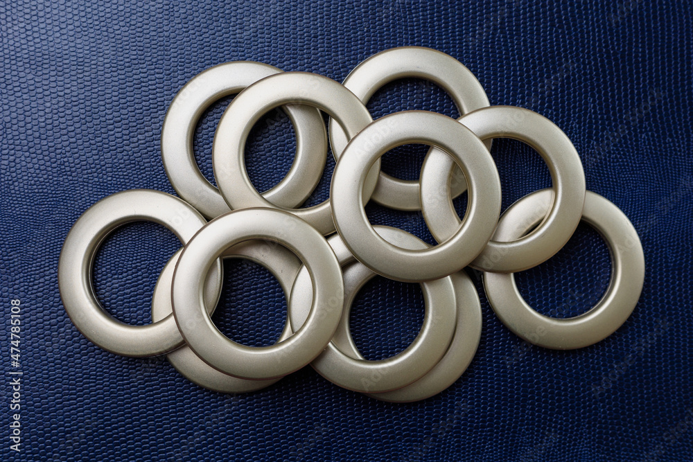 Matte eyelets for curtains on a colored background. Decor element for ...