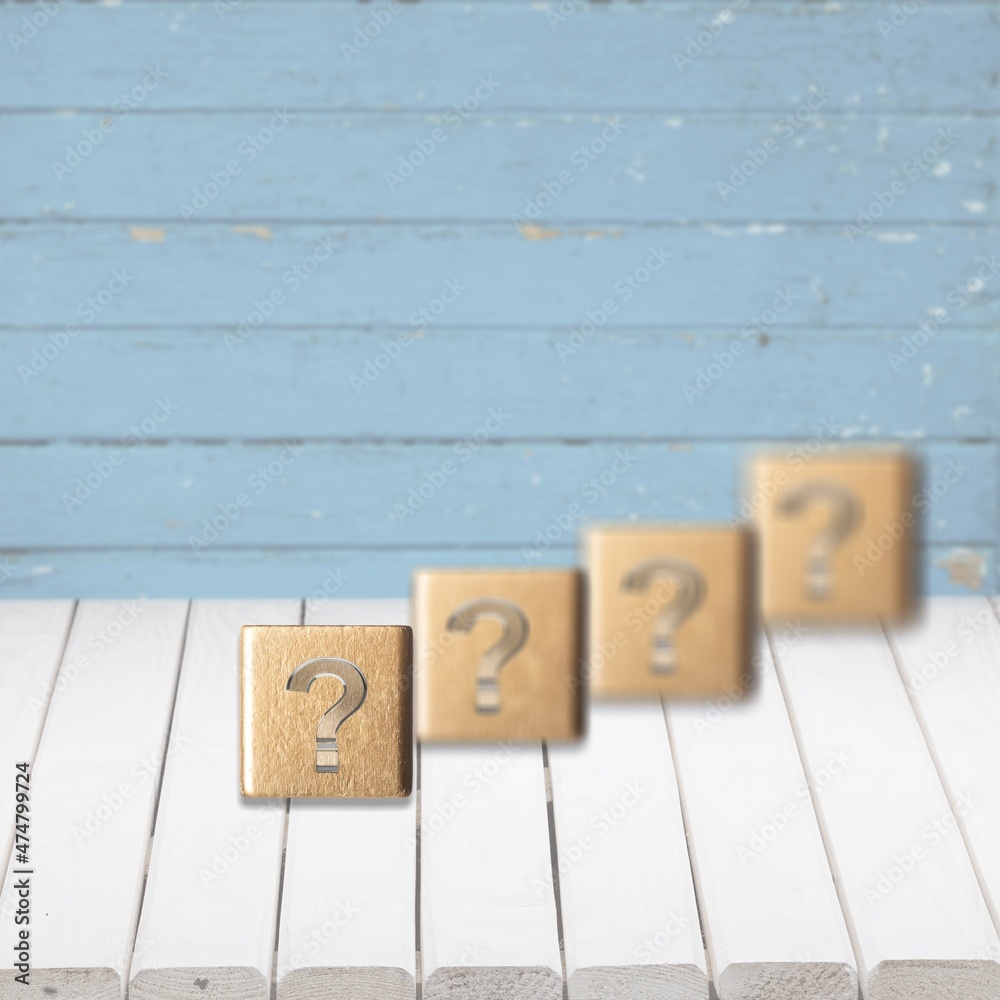 wooden blocks with a question mark. frequently asked questions ...