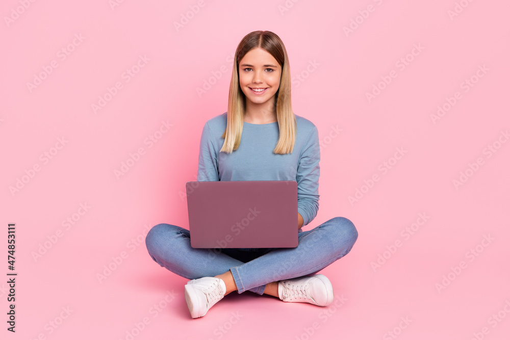 Full body photo of young girl use laptop sit floor homework courses ...