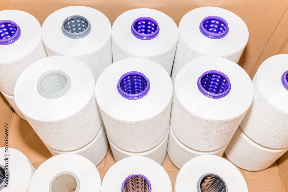 In industrial sewing machine spun yarn, many thread together.Top view ...
