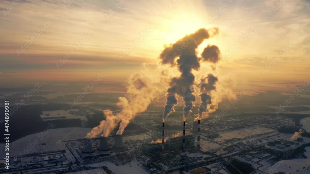 Smoke from the chimneys of the thermal power plant. Power plant from a ...