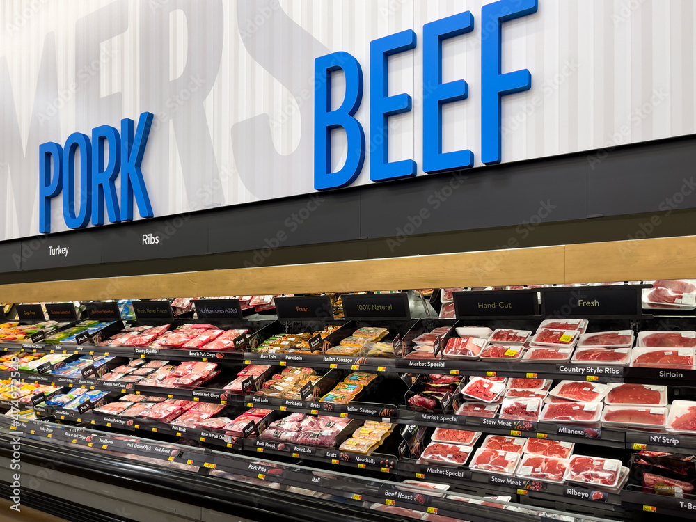 ATLANTA, GEORGIA - DECEMBER 14, 2021 : Fresh beef and pork sign above a ...
