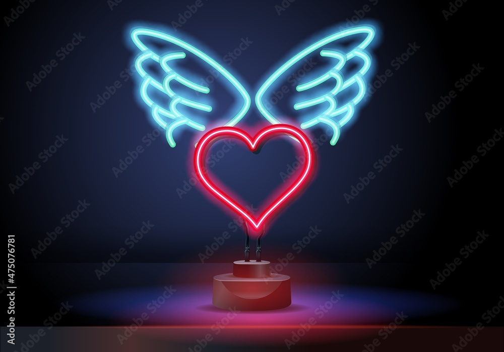 red neon heart with wings. Glowing neon heart with wings on brick wall ...