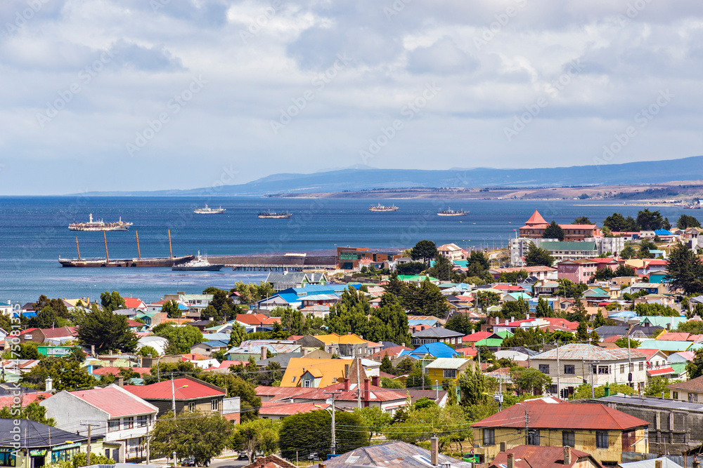 Aerial view of the Punta Arenas town with Strait of Magellan on ...