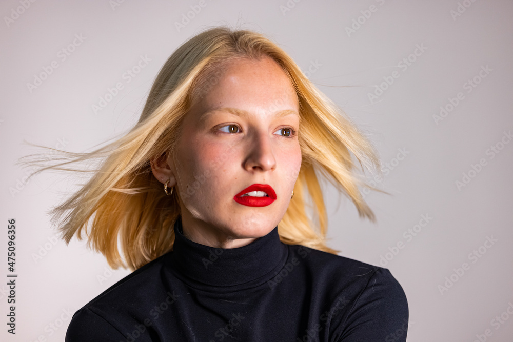 Portrait of young woman with blond short hair. Portrait of smiling ...